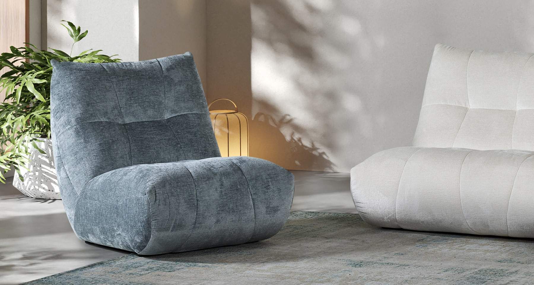 Canapé et chauffeuse modulable finition capitonnée Sutton