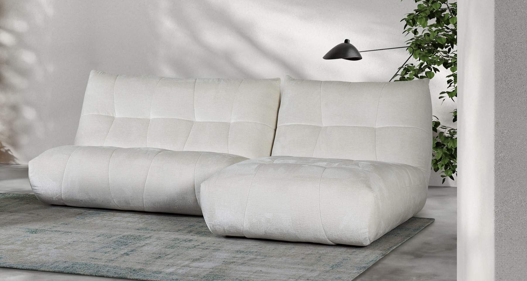 Canapé et chauffeuse modulable finition capitonnée Sutton